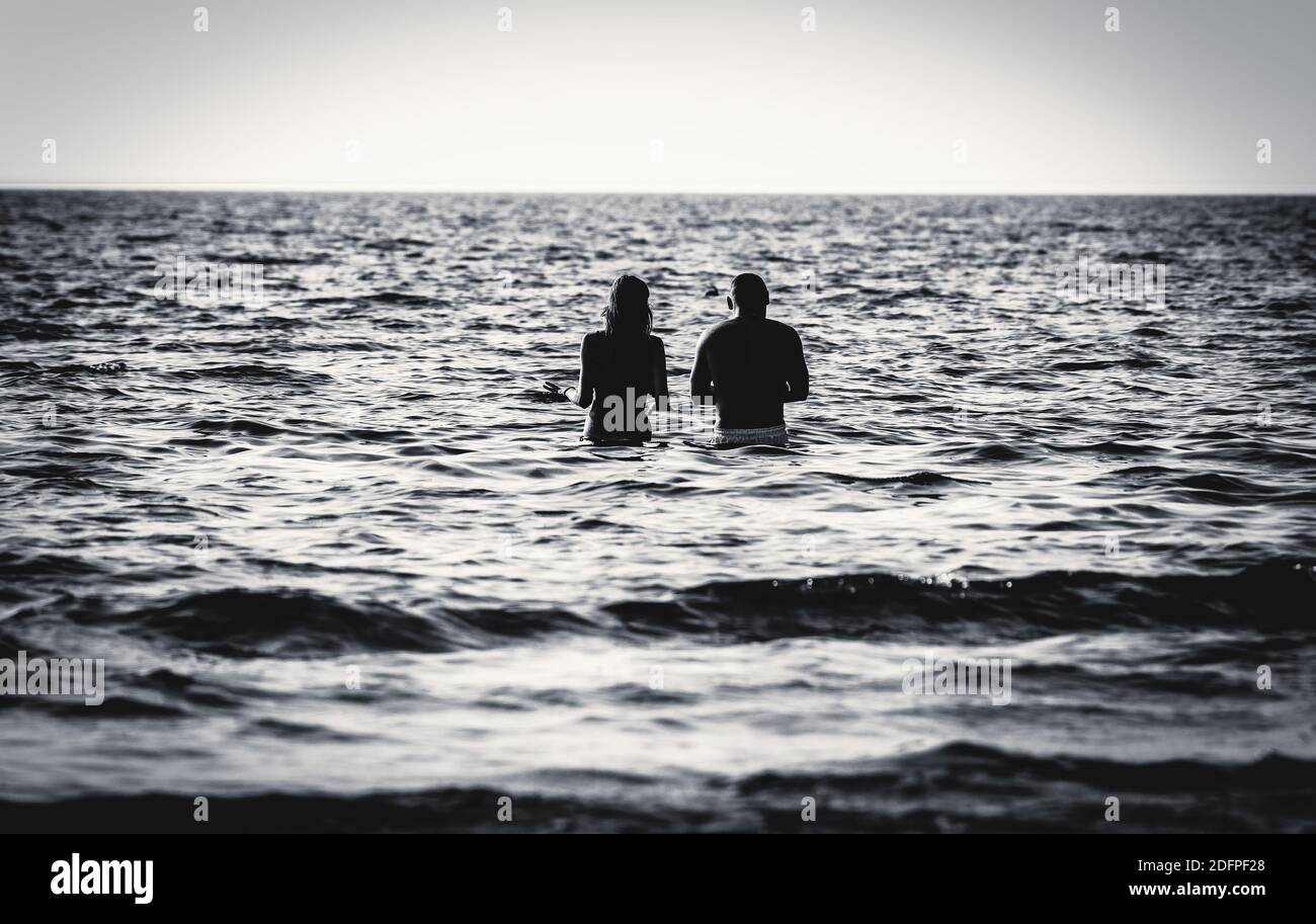 Couple bathing sea hi-res stock photography and images - Alamy