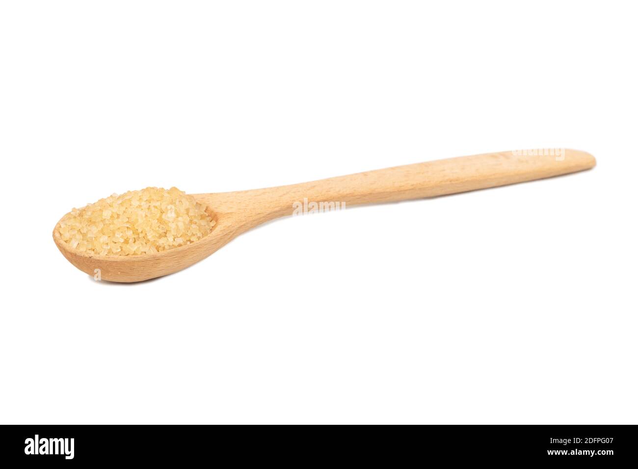 Wooden spoon with brown sugar on a white background Stock Photo - Alamy