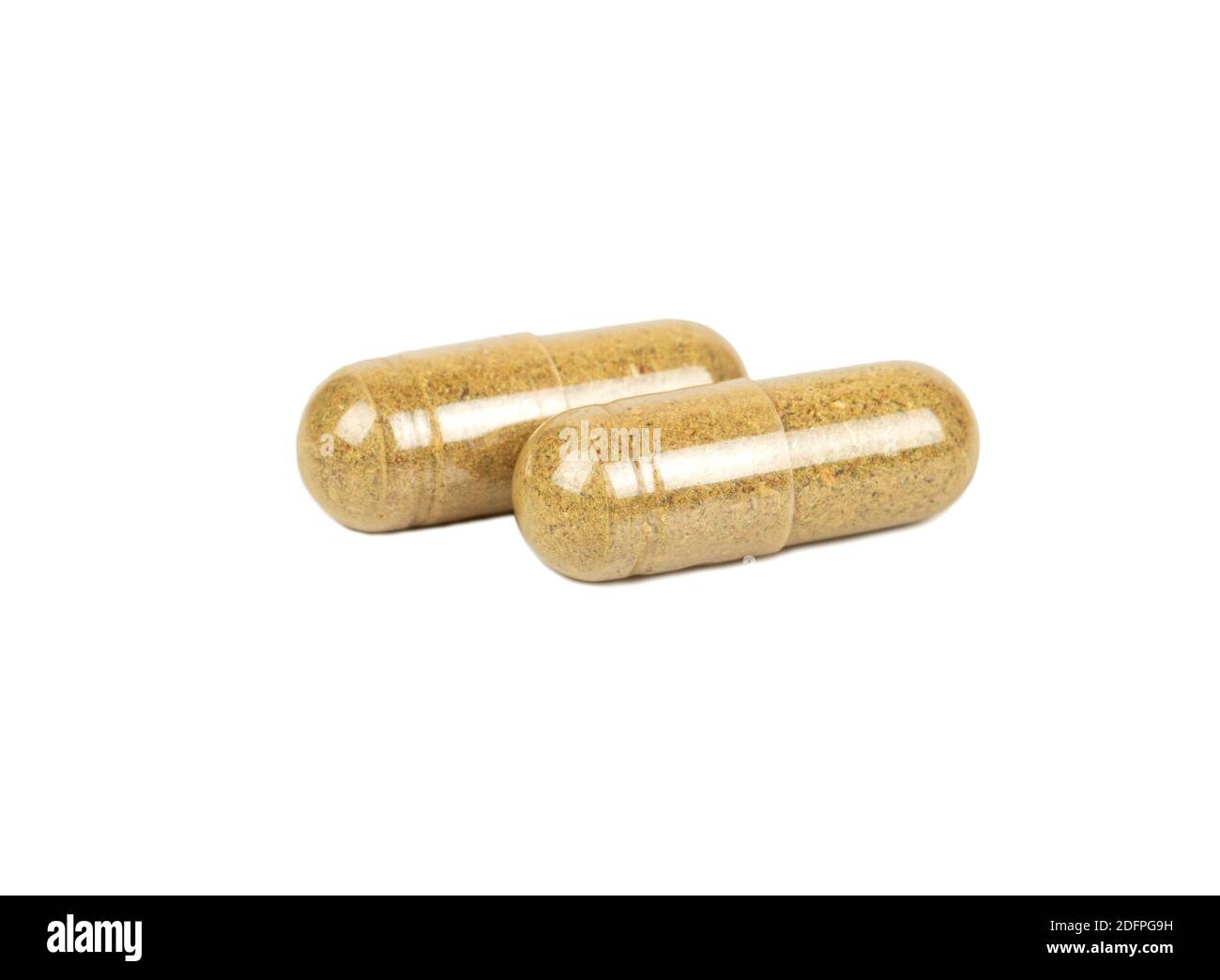 Two homeopathic capsules isolated on a white background Stock Photo - Alamy