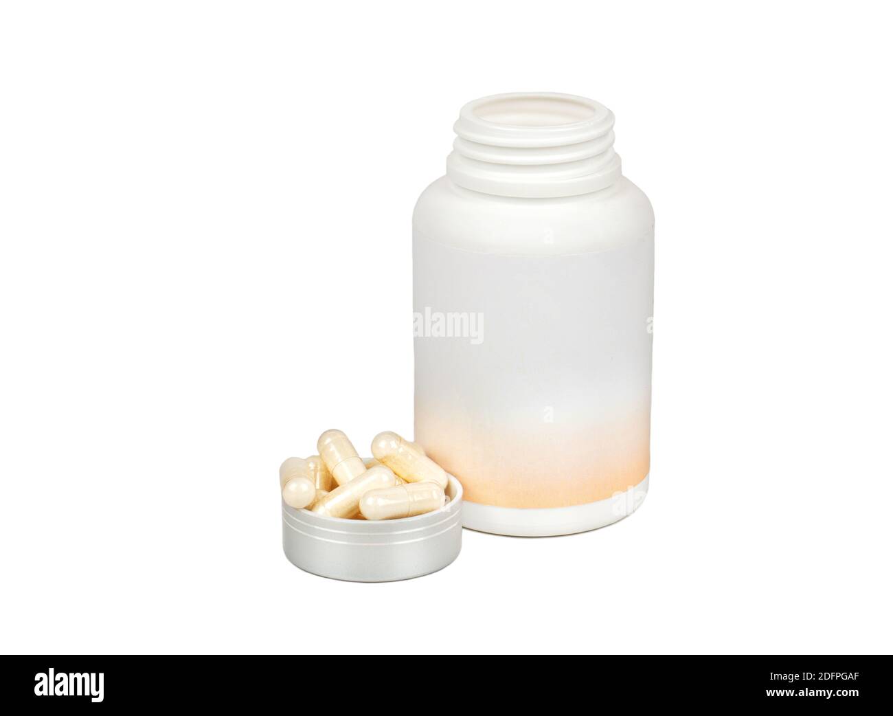 Capsules in a lid with a plastic jar isolated on a white background ...