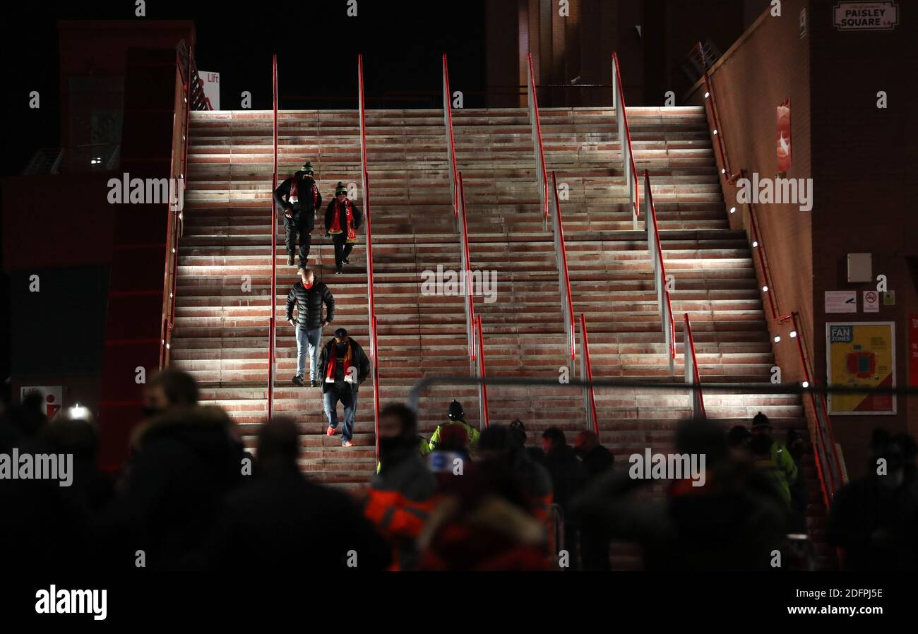 Liverpool fans make their way down the stairs before the match, outside ...