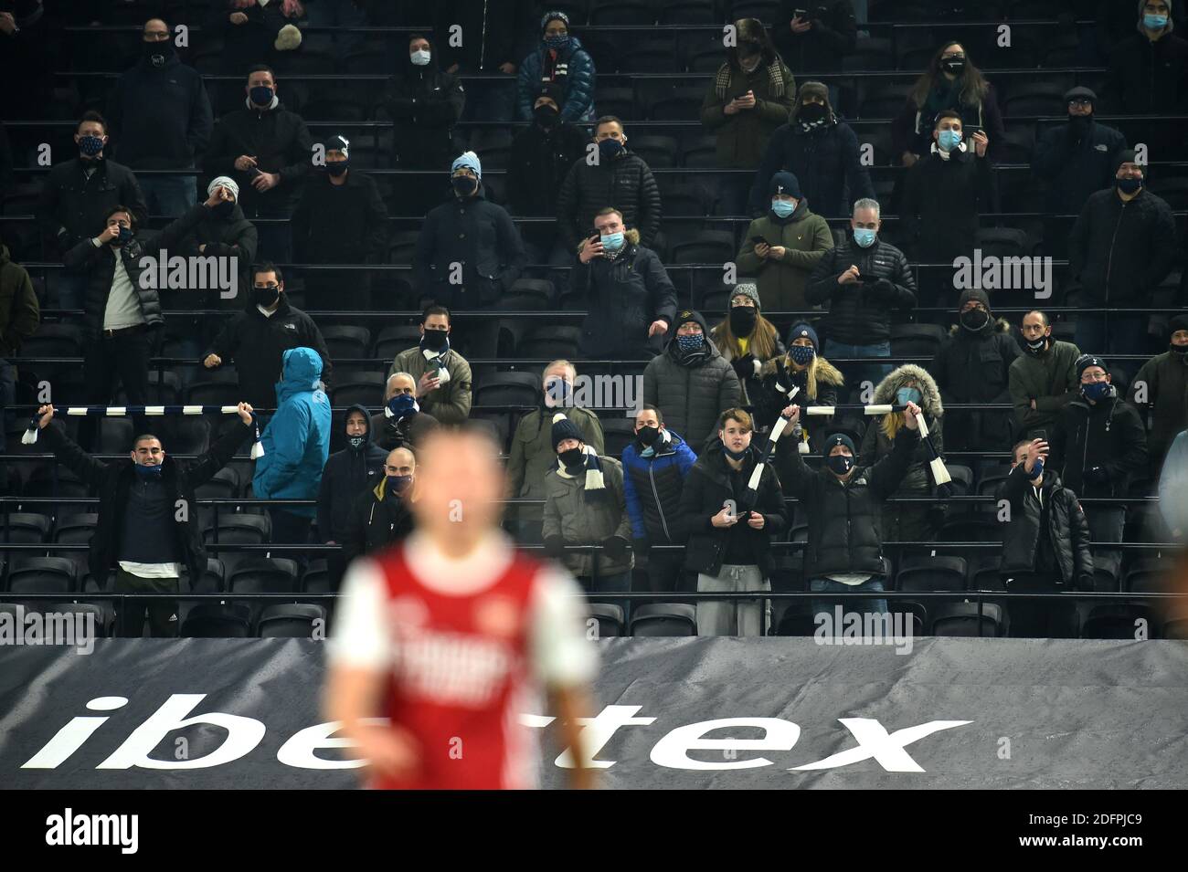 Tottenham Hotspur fans cheer on their side from the stands during the ...