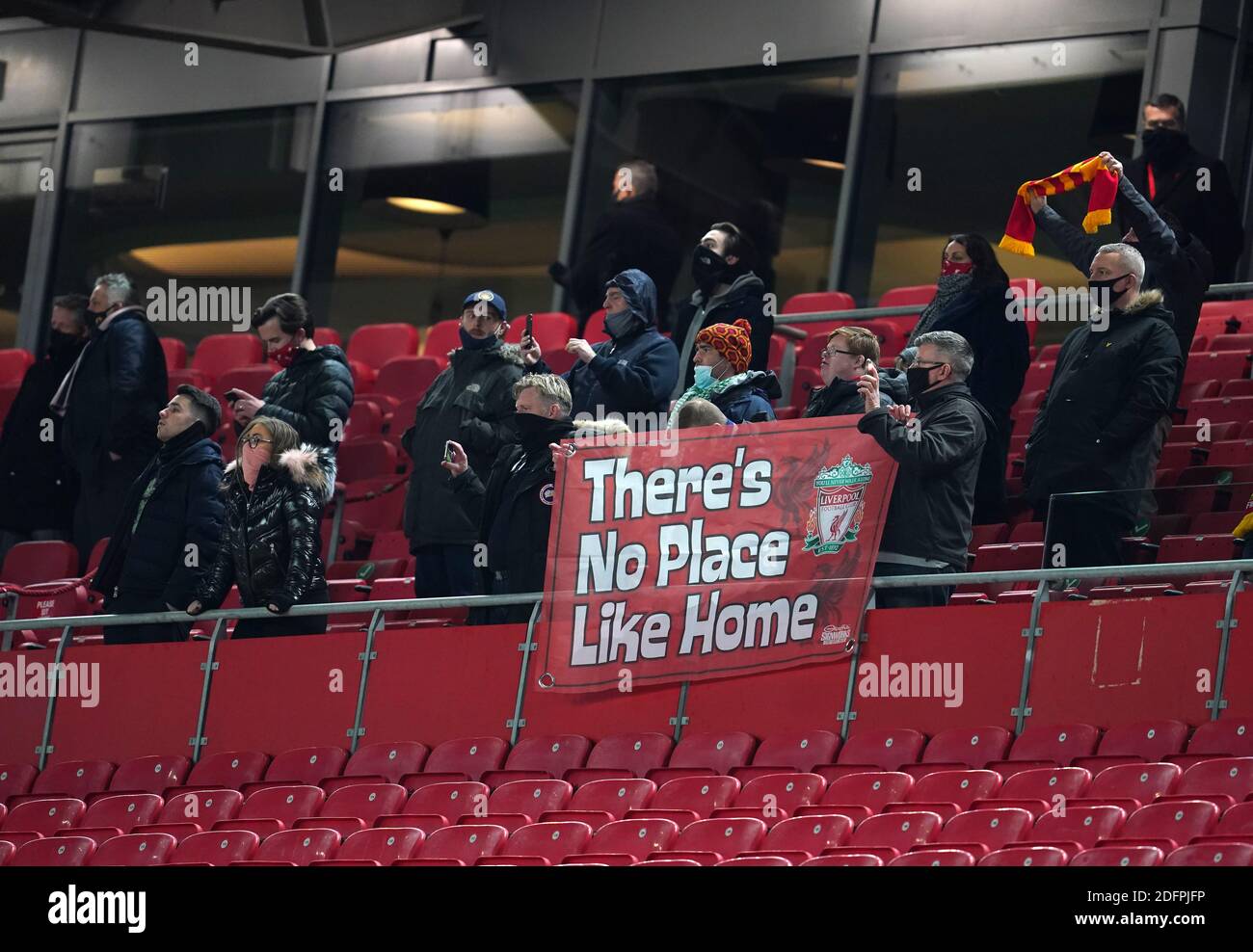 Liverpool fans hold up a banner before the Premier League match at ...