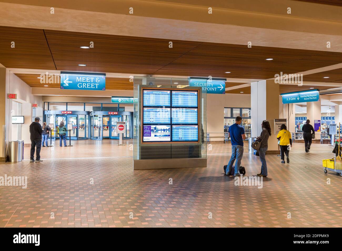 Meet and greet sign and departure board at airport, Albuquerque, New ...