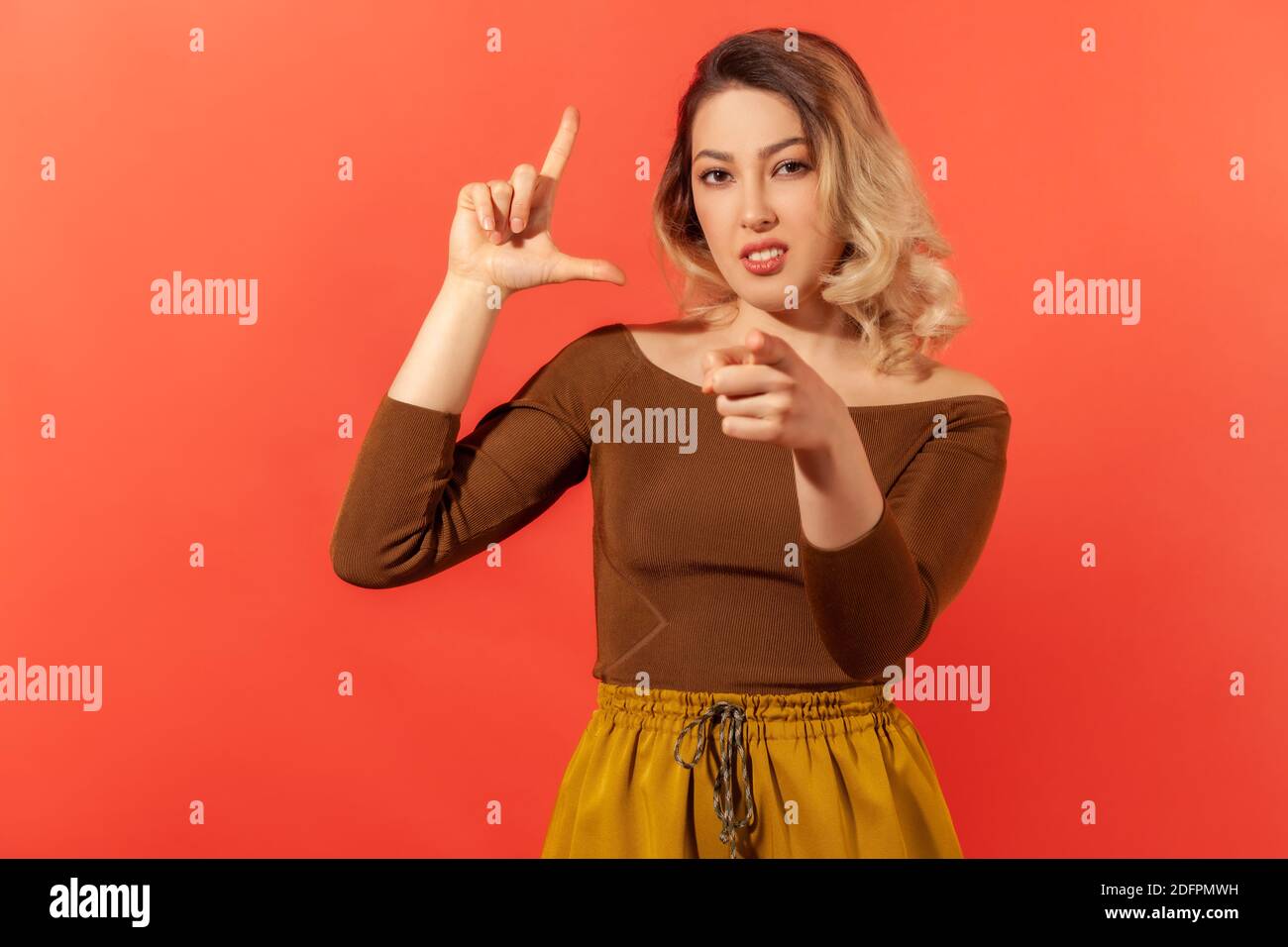 Woman scolding gesture hi-res stock photography and images - Alamy