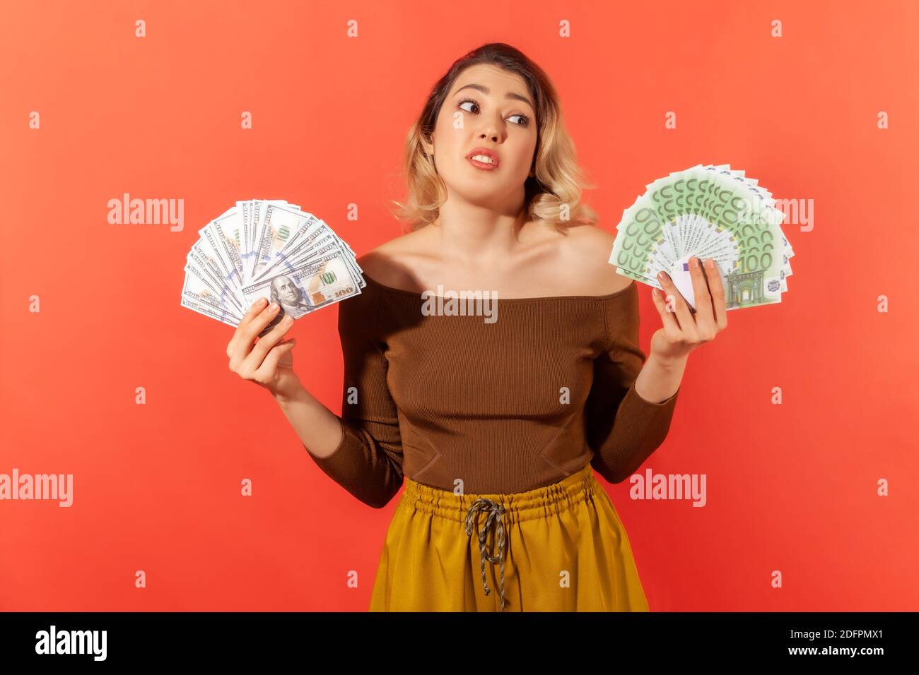 Business woman money fans hi-res stock photography and images - Alamy