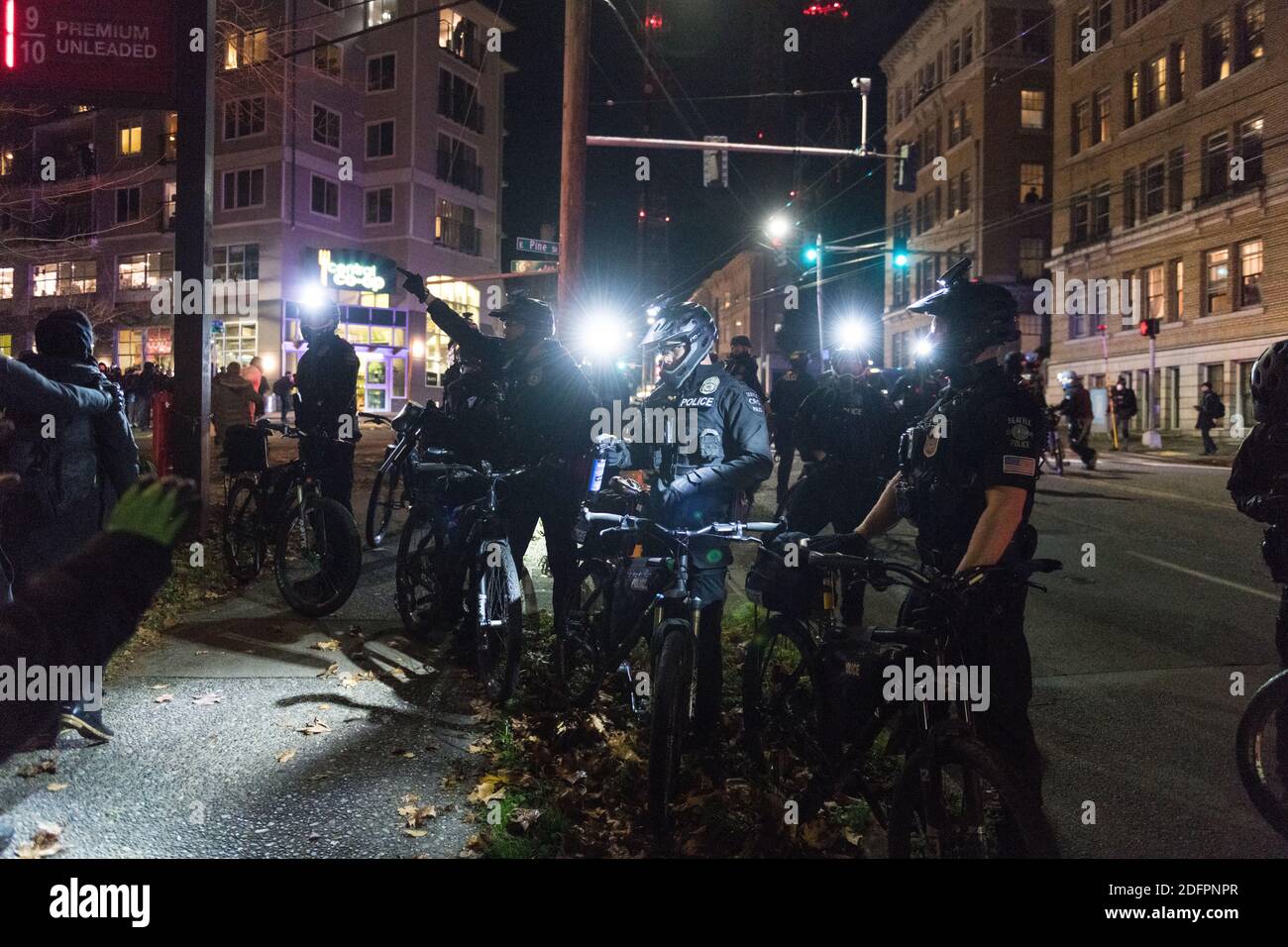 Seattle, USA. 30th Nov, 2020. Police pushing protestors on Capitol Hill ...