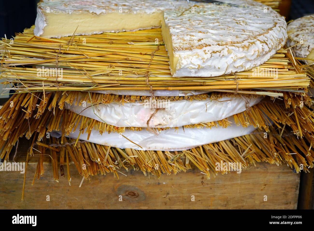 Large wheel of creamy Brie cheese Stock Photo - Alamy