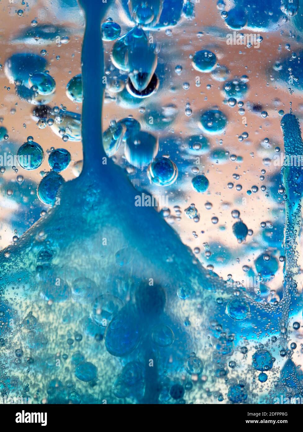 Bubbles forming textured colourful background formed by a simple ...