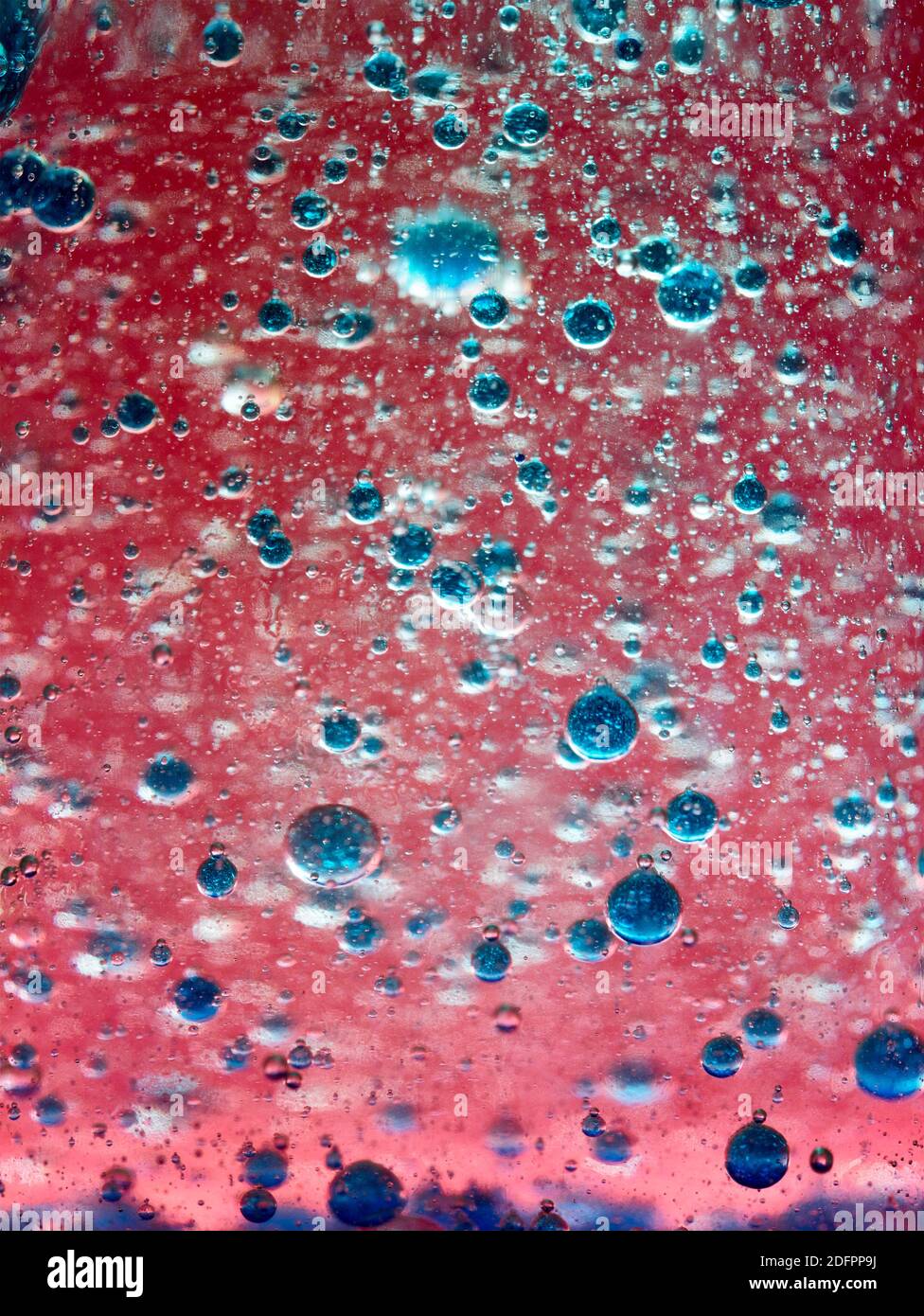 Bubbles forming textured colourful background formed by a simple ...