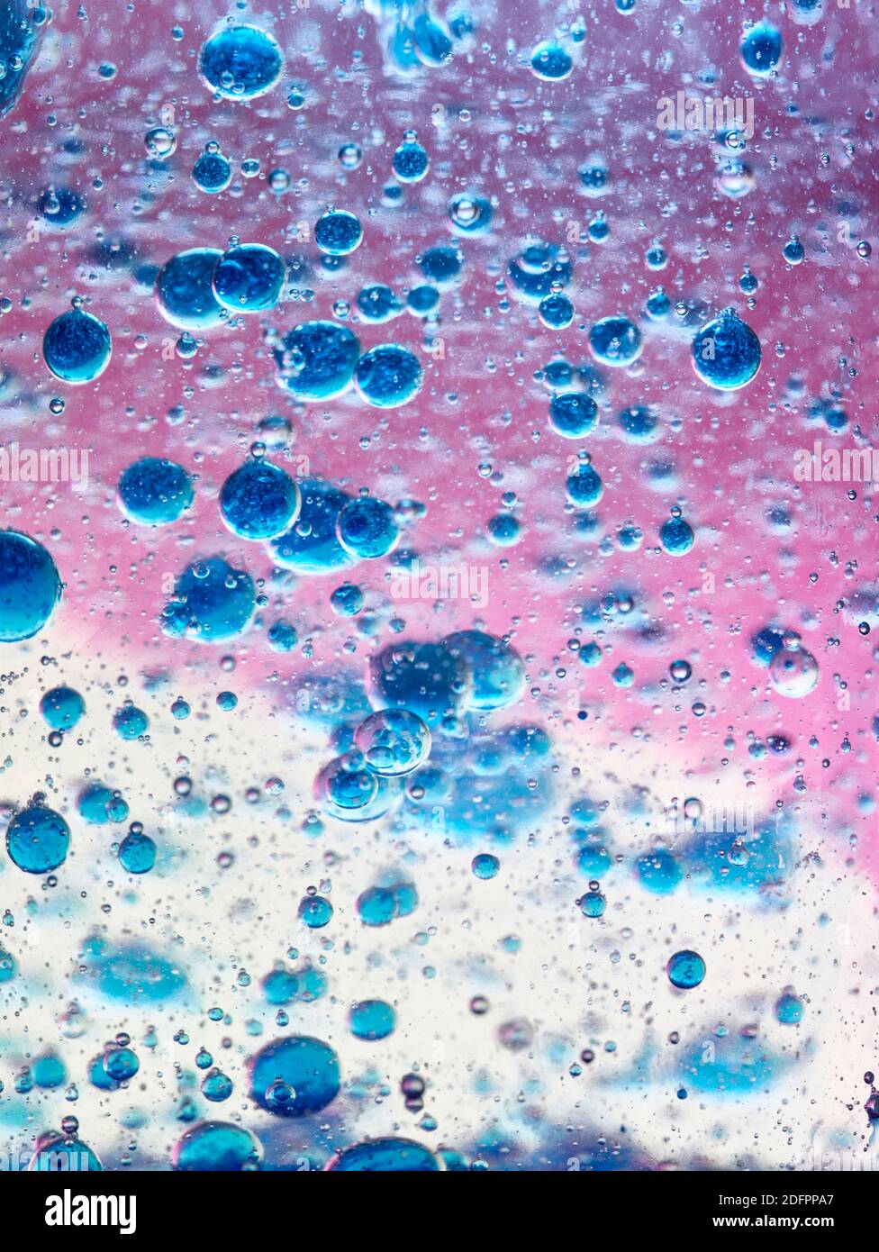 Bubbles forming textured colourful background formed by a simple ...