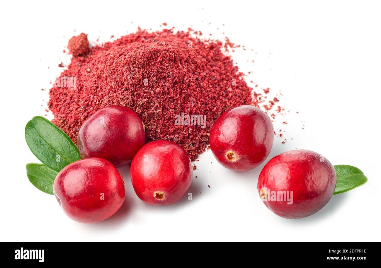 dried cranberry powder and fresh cranberries isolated on white ...