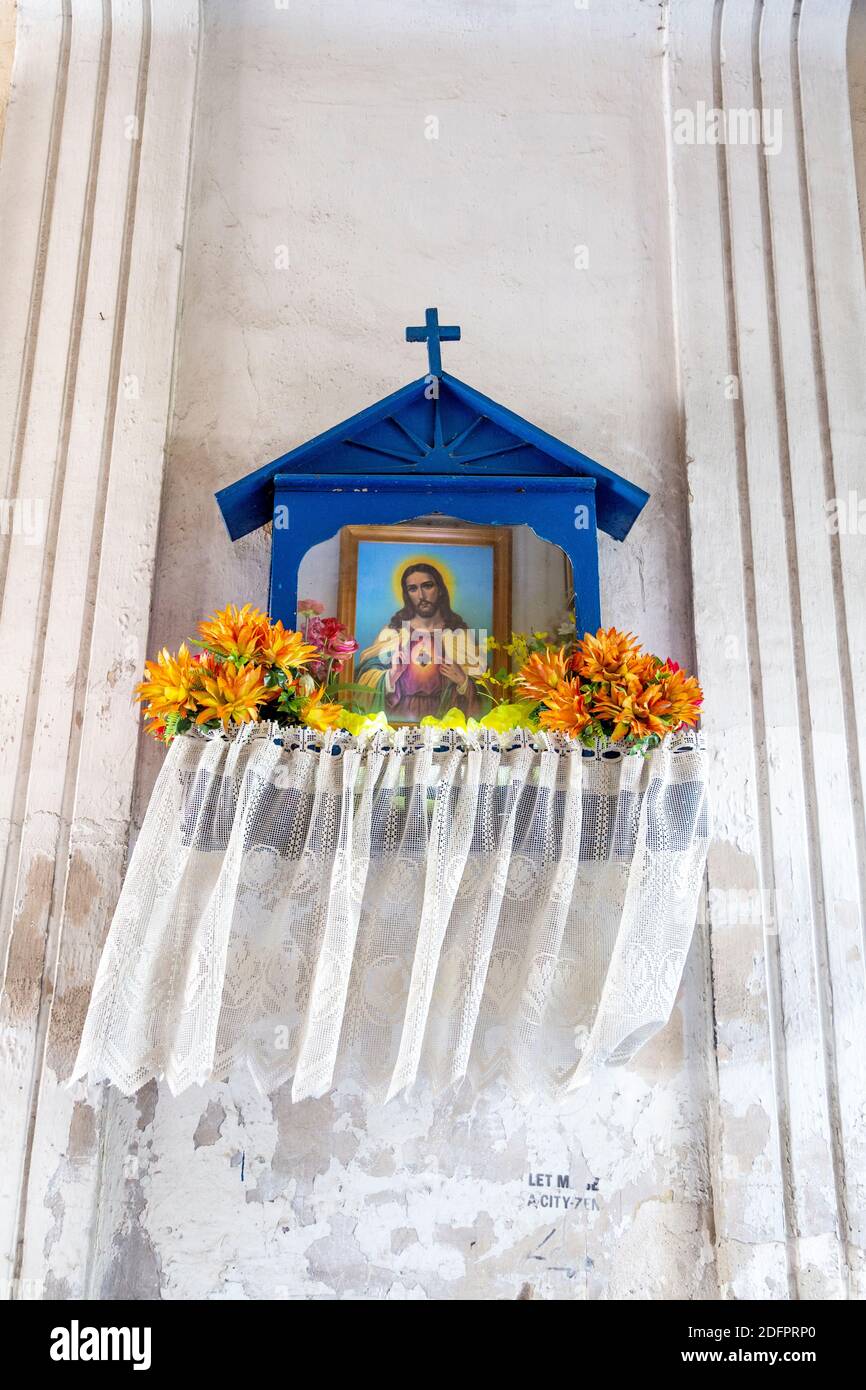 Jesus shrine in a courtyard passage in one of the Praga district ...