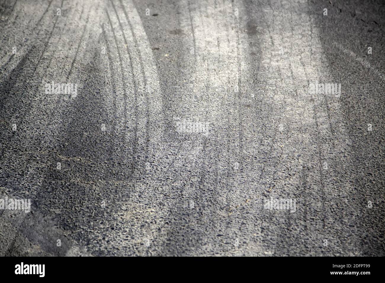Wheel tracks on urban street, vehicle skidding, texture Stock Photo - Alamy