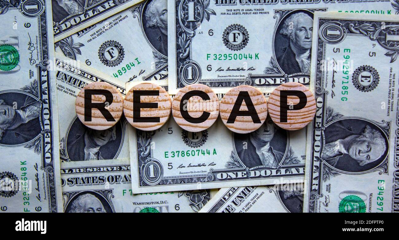 Recap symbol. Wooden circles with word 'recap' on a beautiful ...