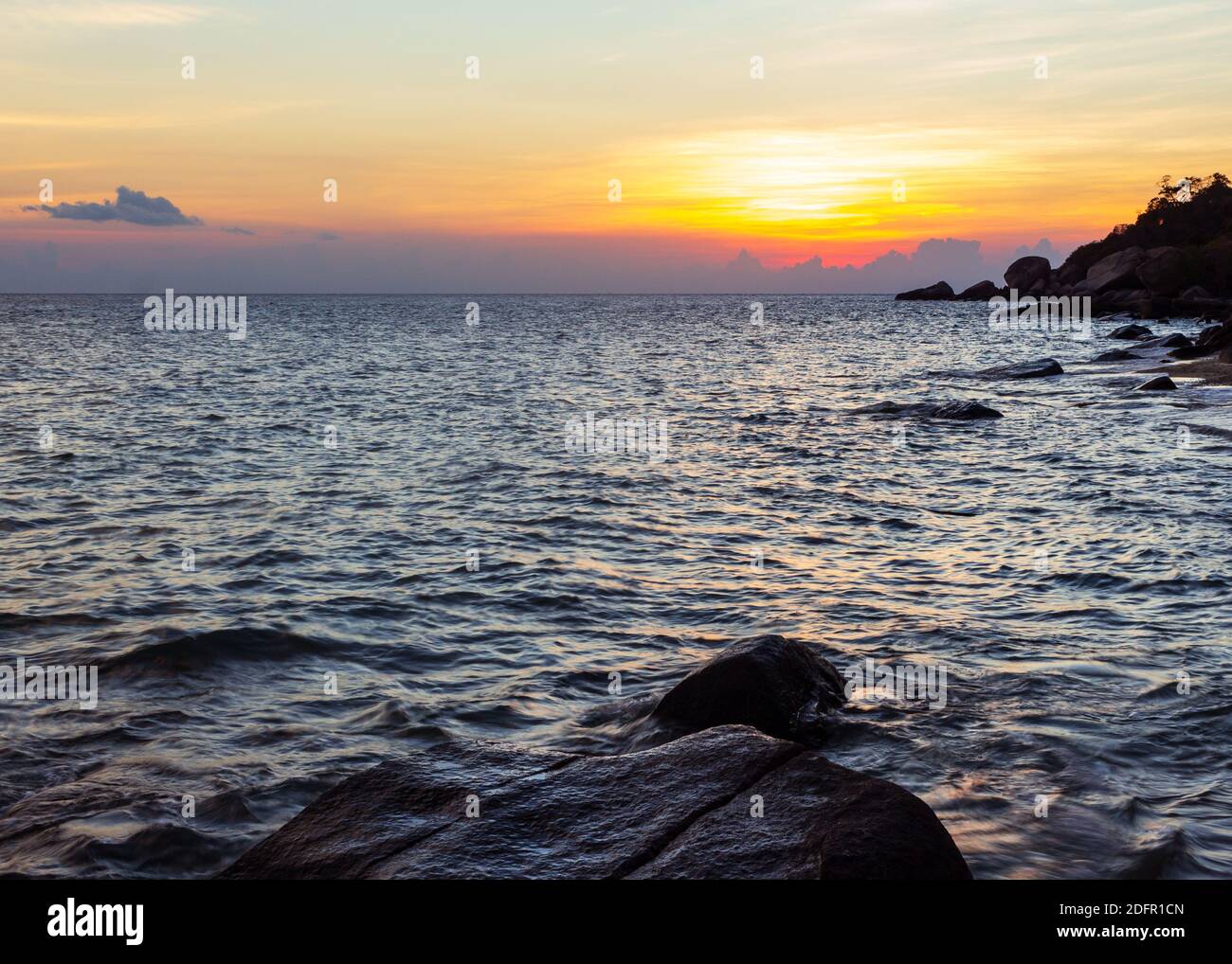 Thailand island beautiful sunset time at beach, shining sea water waves ...