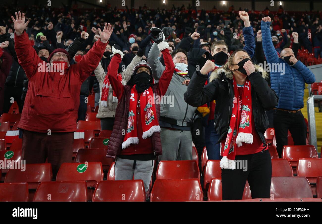 Liverpool fans in the stands celebrate their sides second goal during ...