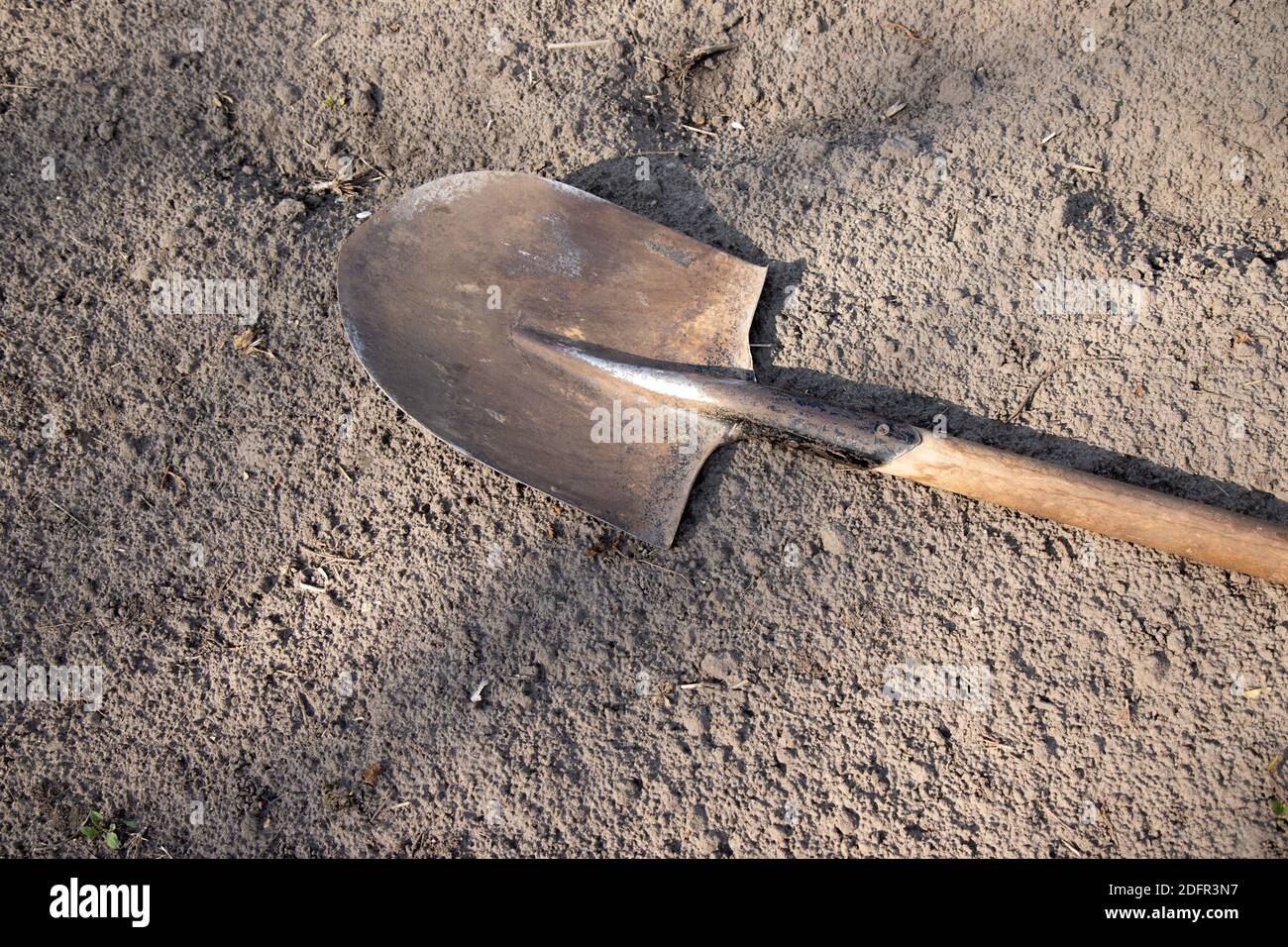 Digging spring soil with shovel. Close-up. Shovel on the ground ...