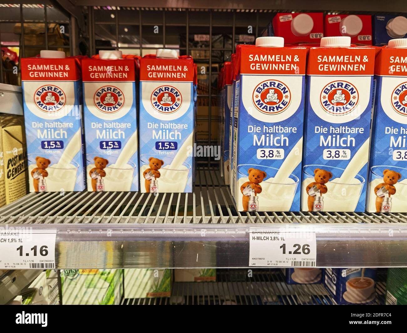 Berlin, Germany - December 1, 2020: View to a shelf with different milk ...
