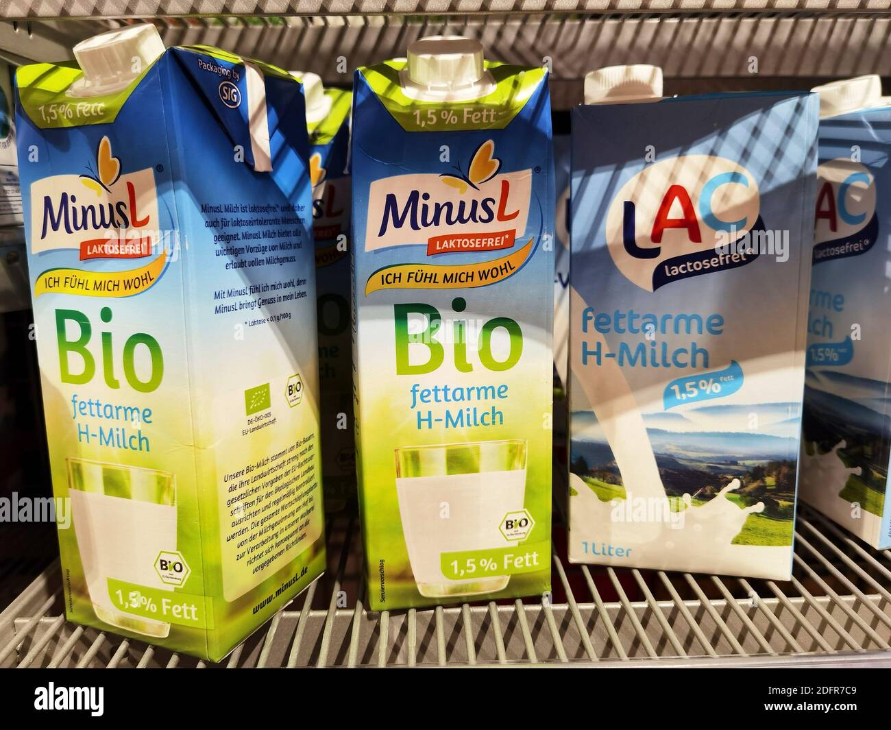 Berlin, Germany - December 1, 2020: View to a shelf with different milk ...