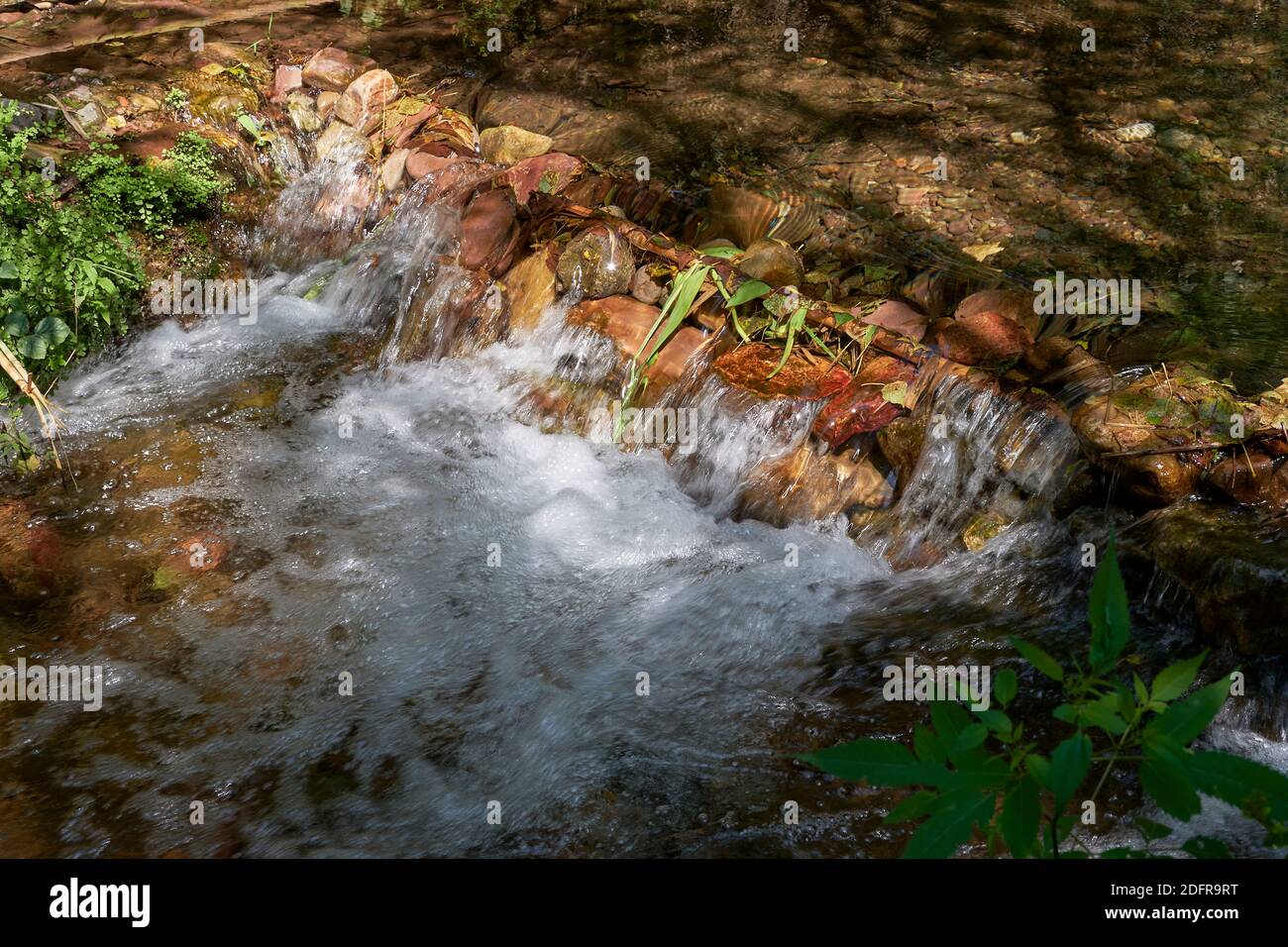 Crystal clear waters of mountain river in a waterfall, transparent ...