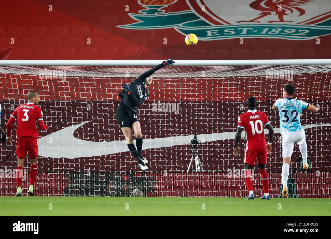 Liverpool goalkeeper Caoimhin Kelleher makes a save during the Premier ...