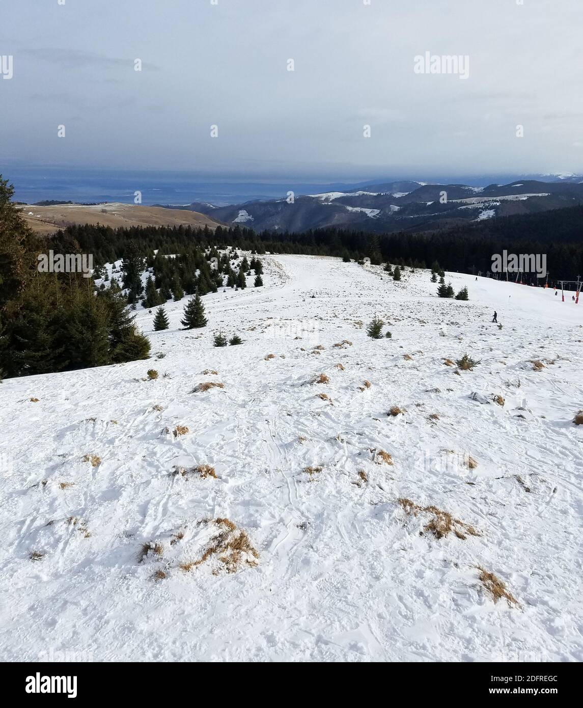 Winter background with a ski slope in the Paltinis resort area, in ...