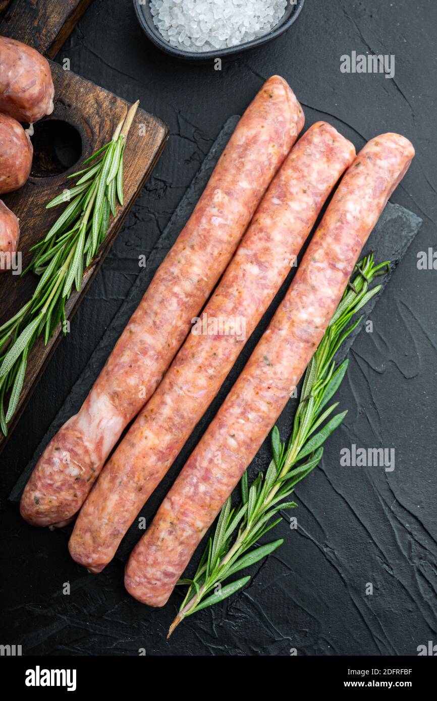 Traditional beef sausages, top view, on black background Stock Photo ...