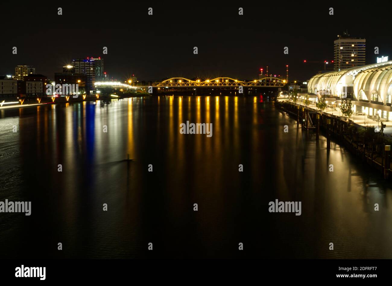 longexposure mannheim water harbor night reflections buildings Stock Photo - Alamy