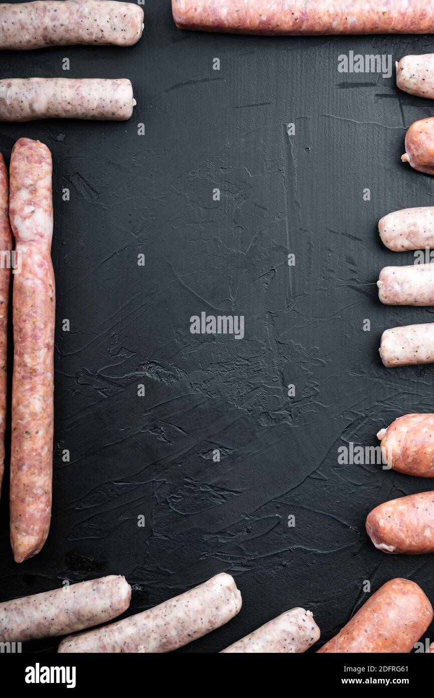 Fresh raw pork, beef and chicken sausages, frame or border concept, top ...