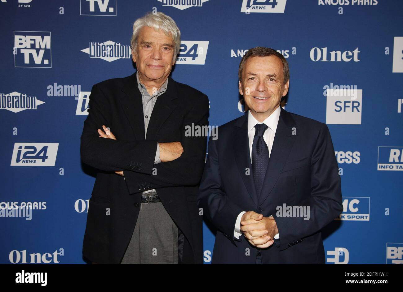 Bernard Tapie and Alain Weill attending Altice Campus Opening in Paris ...