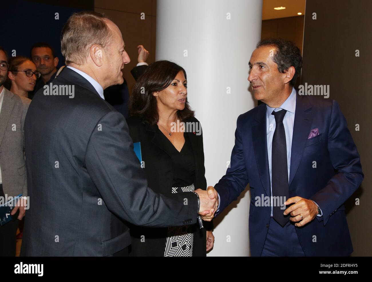 Philippe Goujon, Anne Hidalgo and Patrick Drahi attending Altice Campus ...