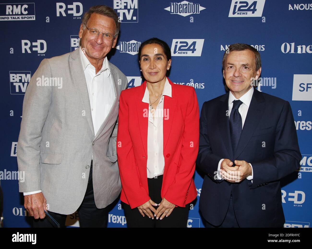Jean-Paul Baudecroux with his wife and Alain Weill attending Altice ...