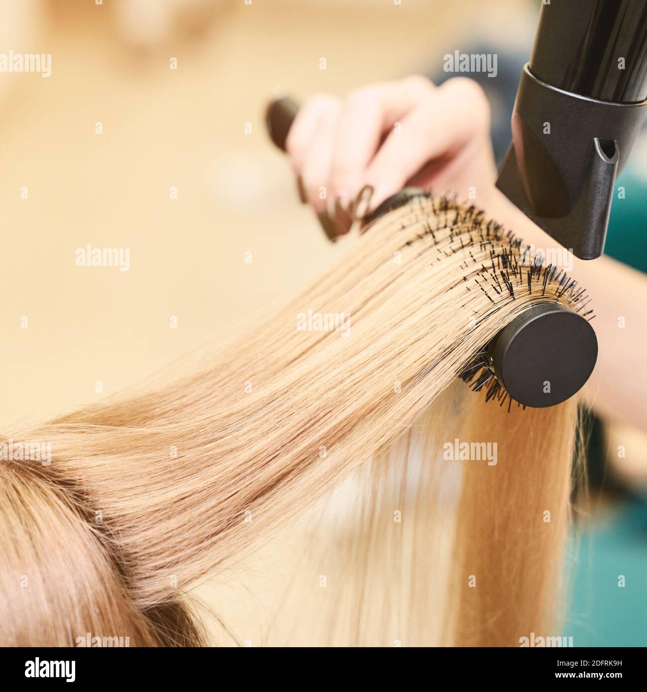 Repair hair procedure. Haircut at salon. Woman hairstyle Stock Photo ...