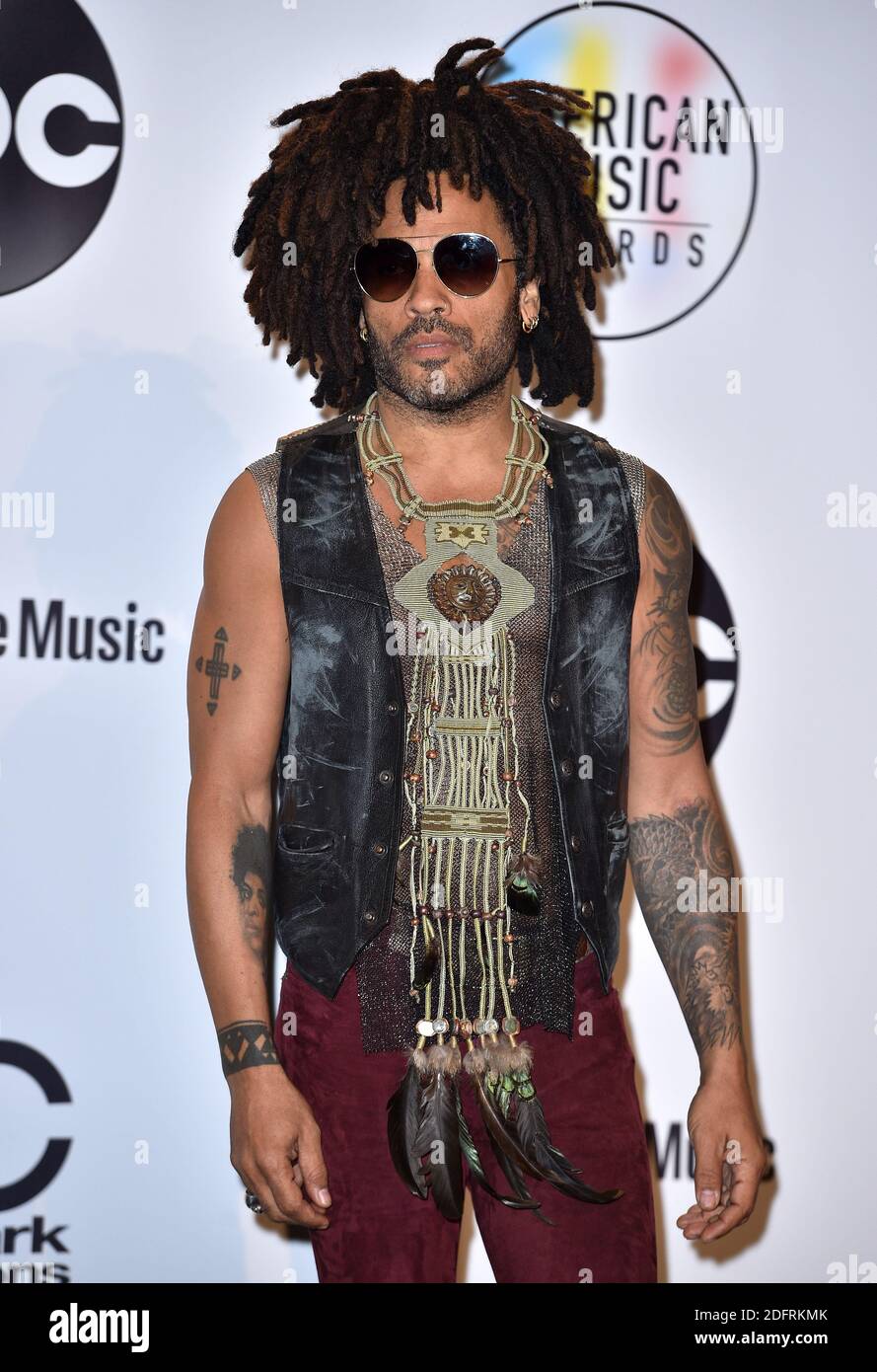 Lenny Kravitz poses in the press room during the 2018 American Music ...