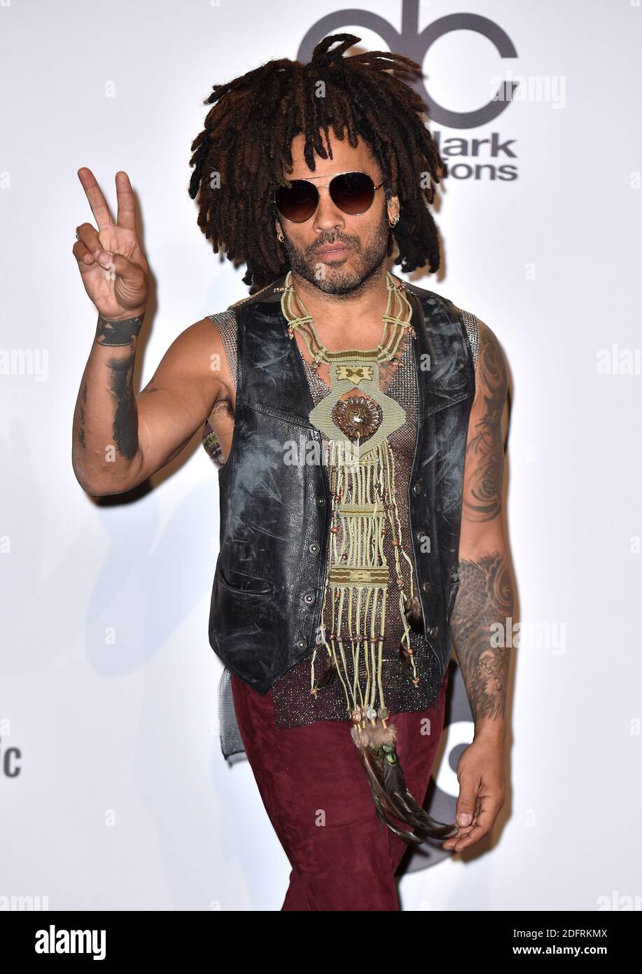 Lenny Kravitz poses in the press room during the 2018 American Music ...