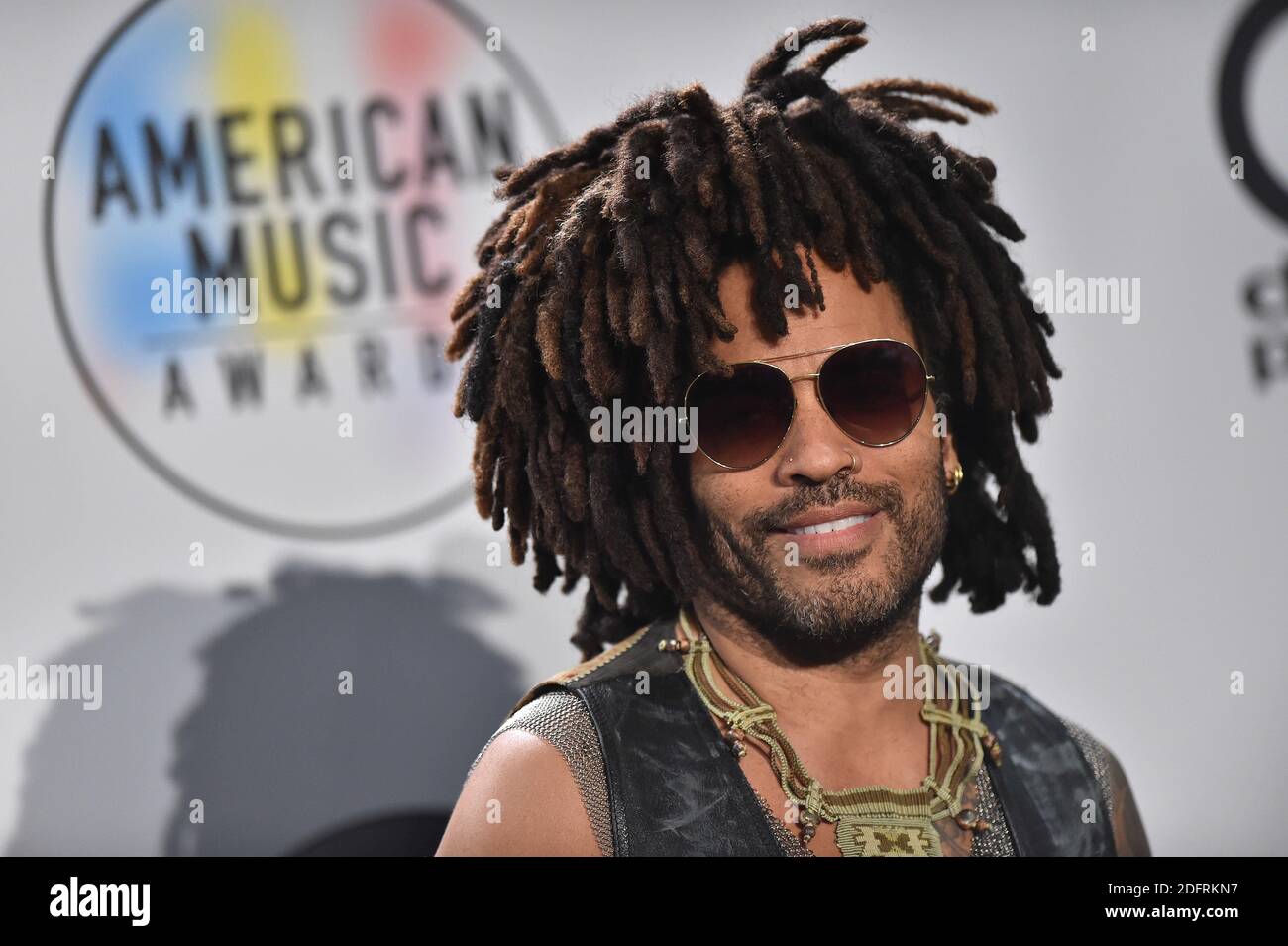 Lenny Kravitz poses in the press room during the 2018 American Music ...