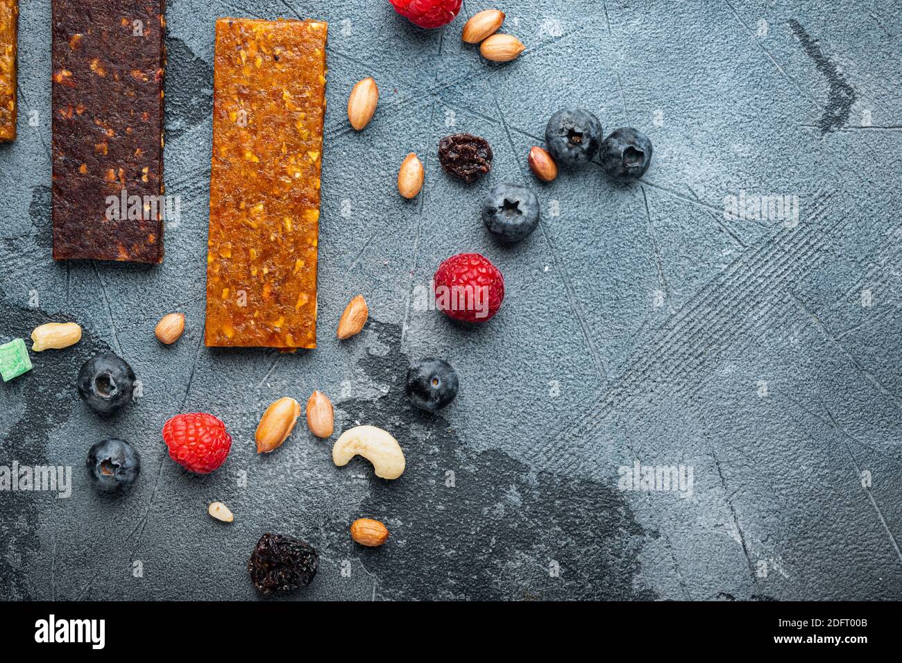 Fruit berry nut energy bars, healthy snack, top view with copy space ...