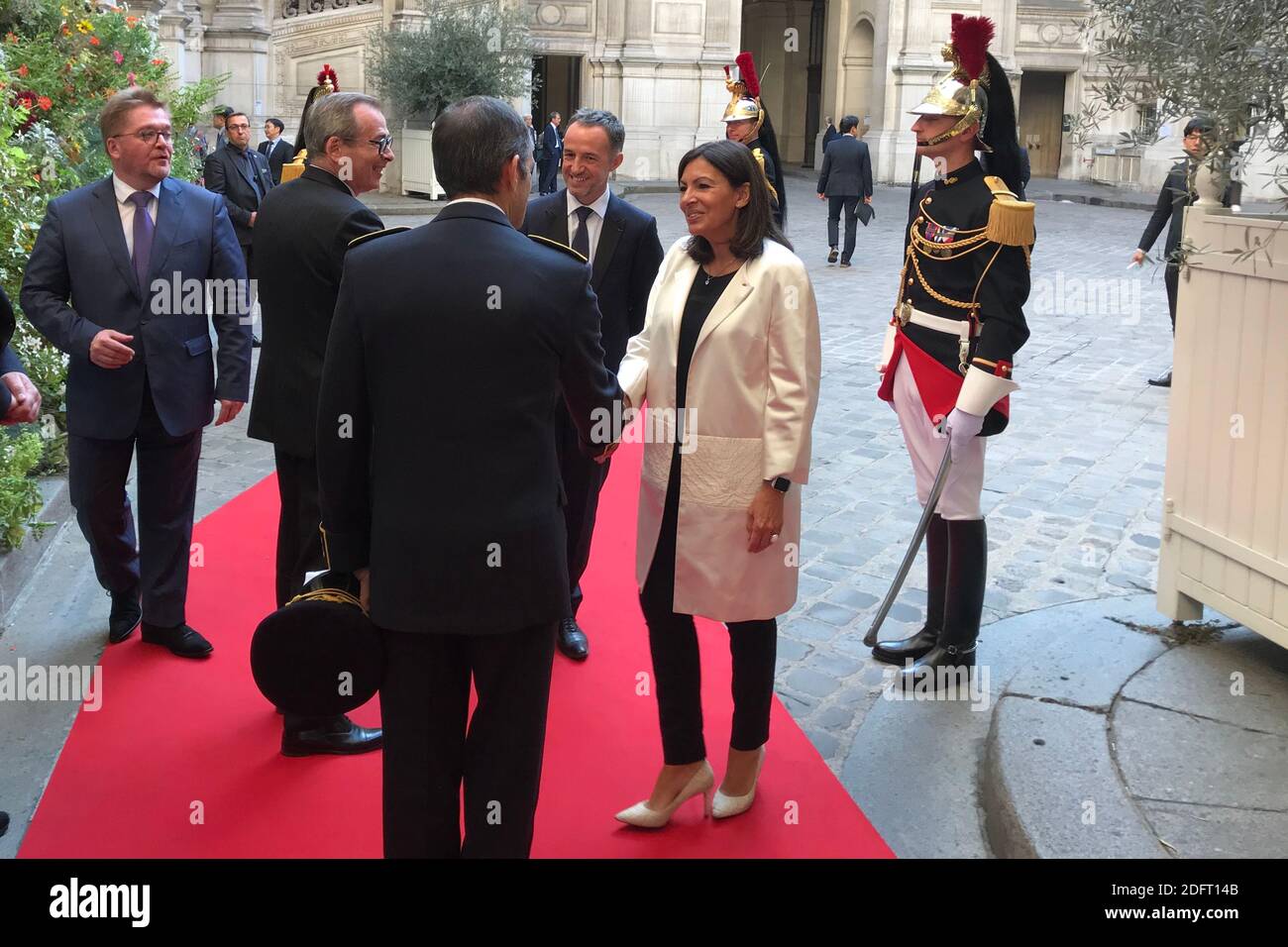 On the right : Mayor of Paris Anne Hidalgo new first helper Emmanuel ...