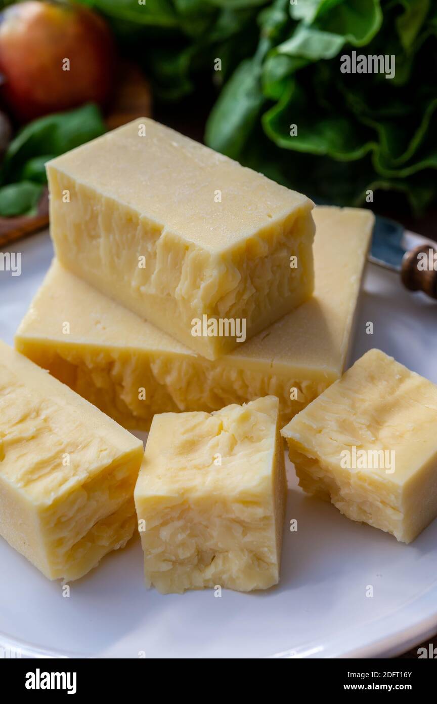 Cheese collection, pieces of aged British cheddar cheese close up Stock ...