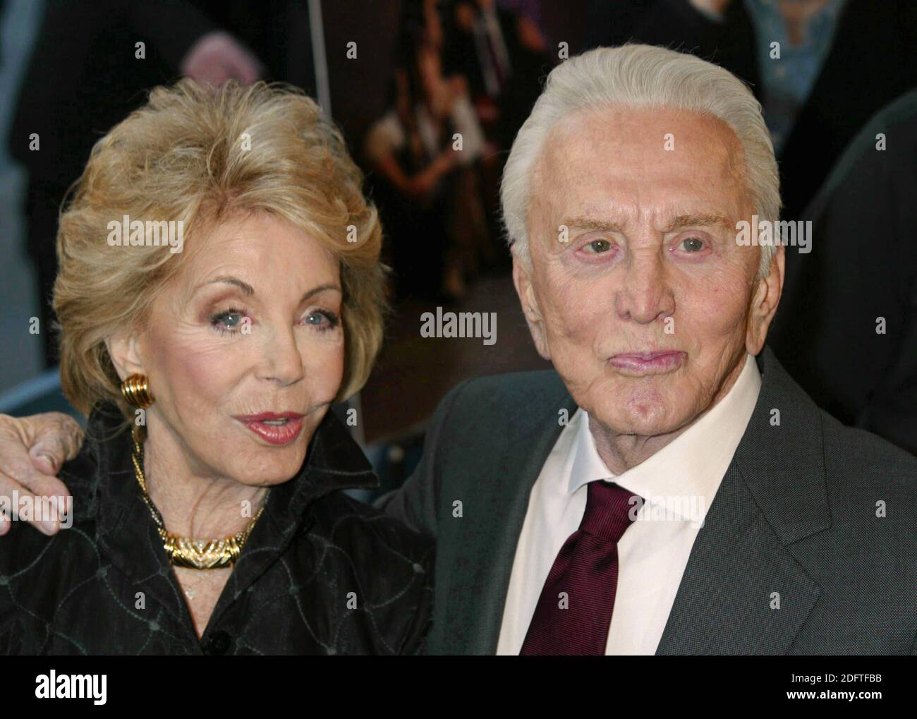Kirk Douglas and wife Anne Buydens attend the premiere of "It Runs in the Family" at Loews ...