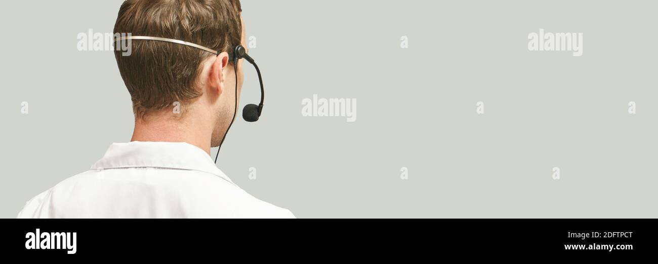 Male doctor with headphones. Studio Medicine portrait Stock Photo - Alamy