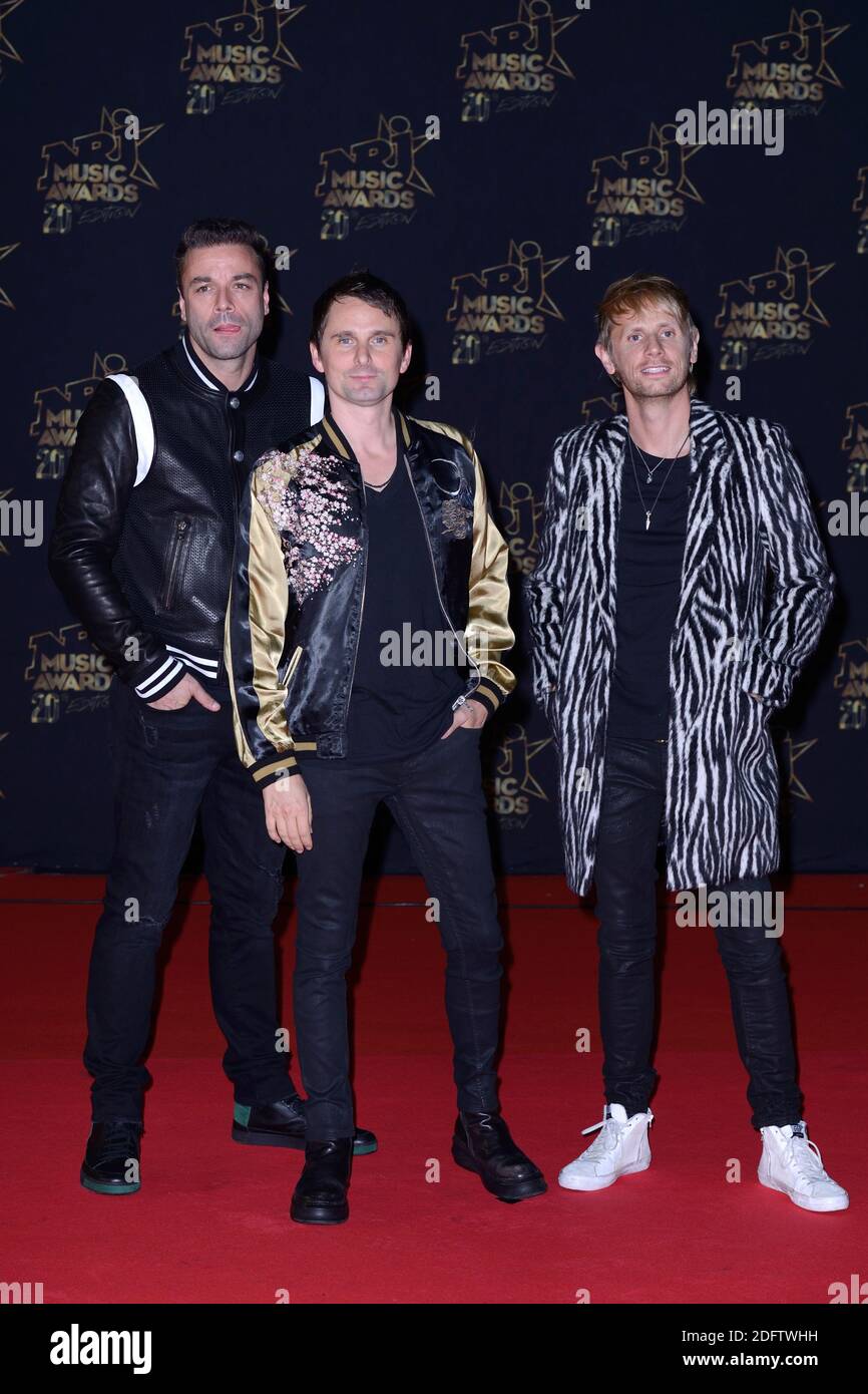 Chris Wolstenholme, Matt Bellamy and Dominic Howard (Muse) attending ...