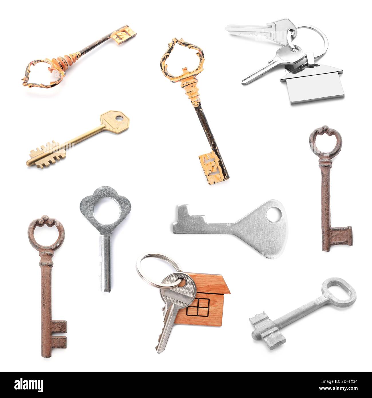 Different keys on white background Stock Photo - Alamy