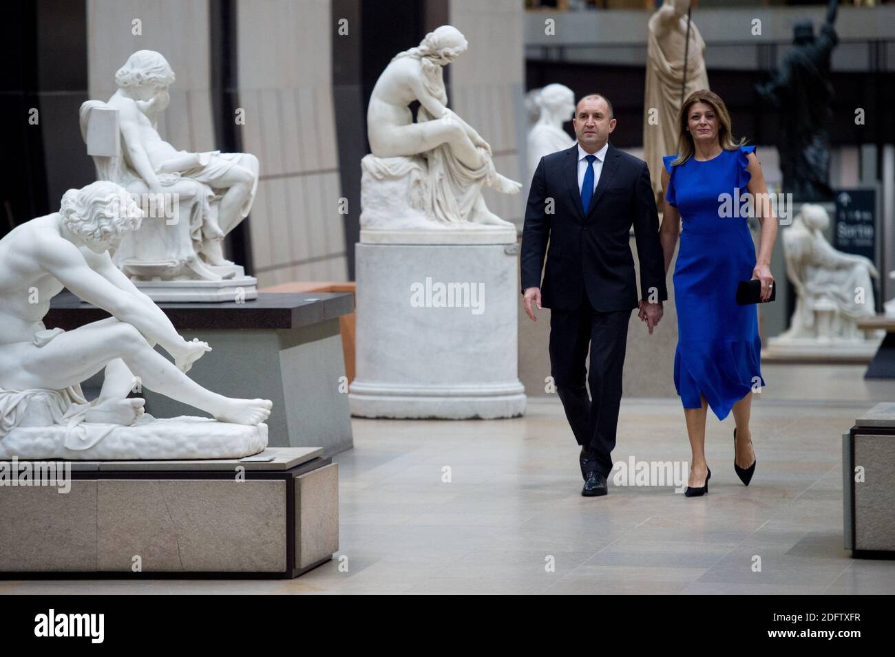 Bulgarian President Rumen Radev (L) and his wife Desislava Radeva (R) arrive at the official ...