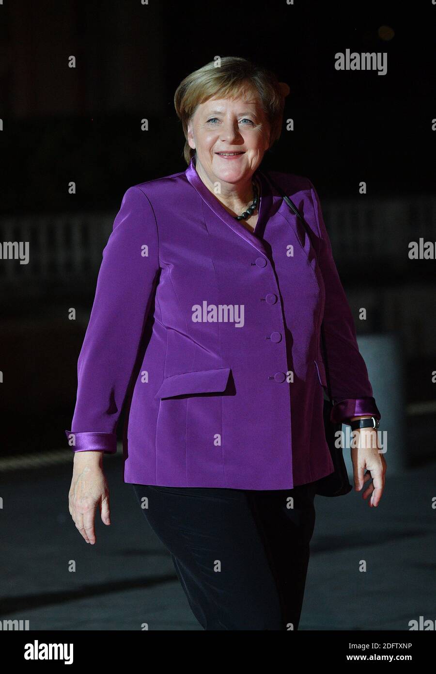 German Chancellor Angela Merkel arriving on eve of the commemoration of ...