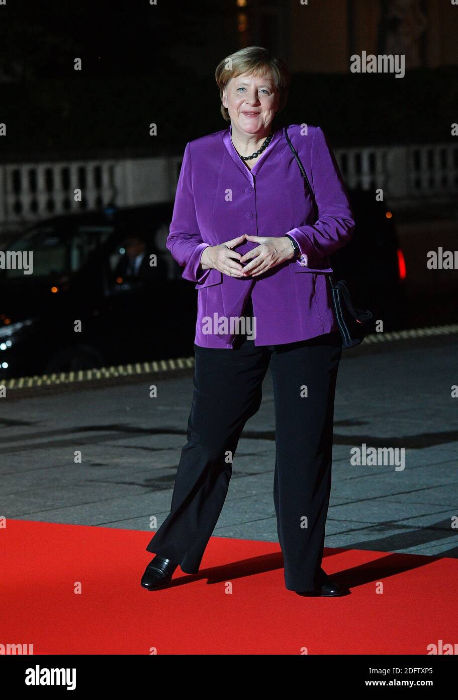 German Chancellor Angela Merkel arriving on eve of the commemoration of ...
