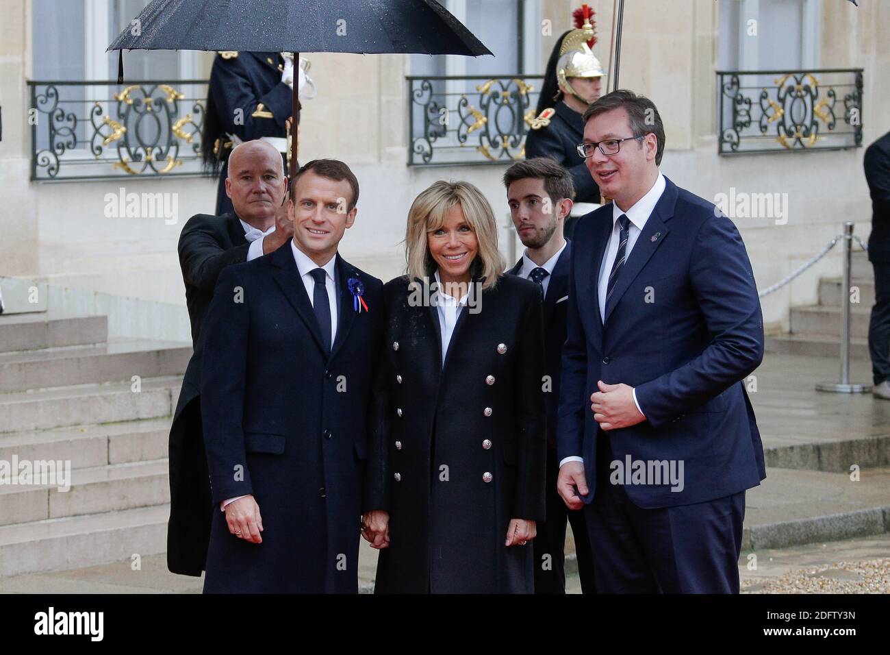 French President Emmanuel Macron and his wife Brigitte Macron welcome ...