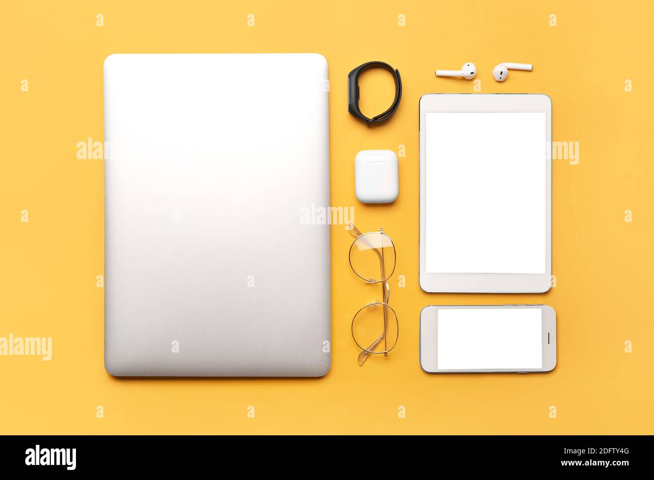 Modern gadgets on color background Stock Photo - Alamy