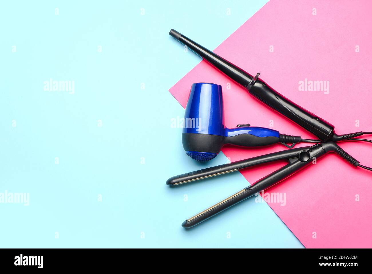 Set of hairdresser's devices on color background Stock Photo - Alamy
